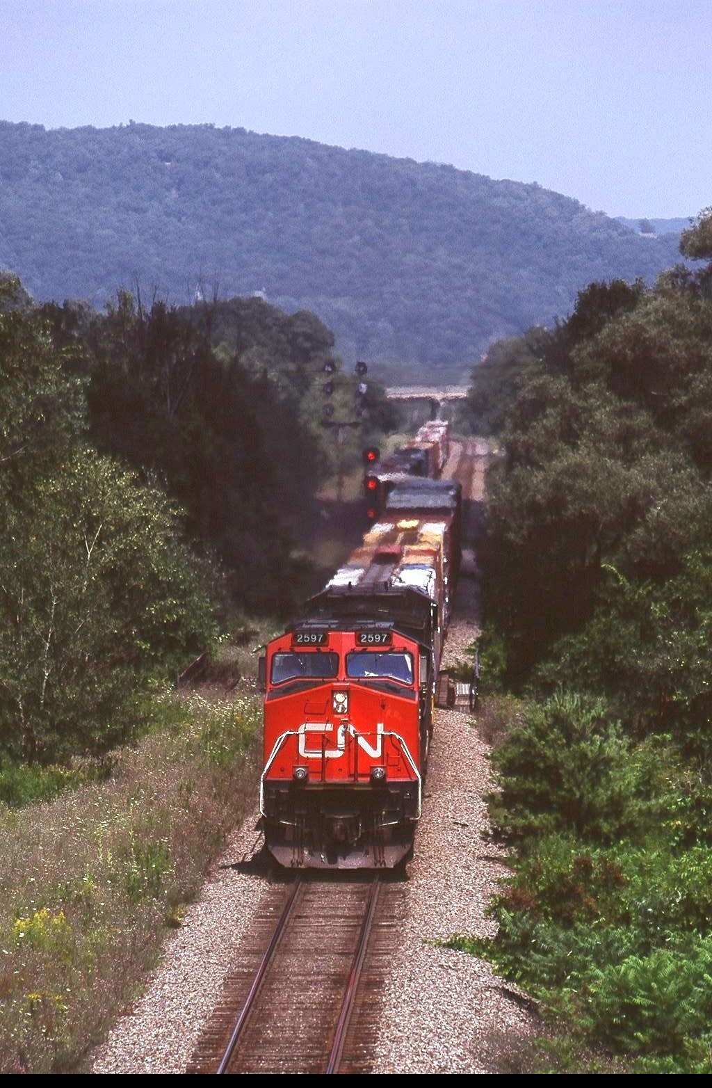 NS 930 rolls through CPF 542 in Oneonta, NY on a hot August 1, 2006.